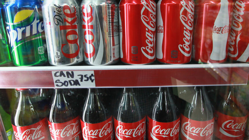 How a prolonged war in Sudan could threaten global fizzy drink supply ...