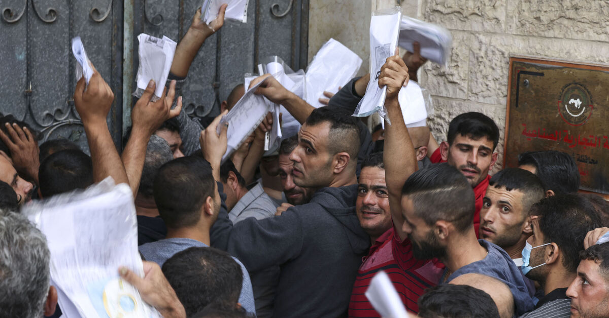 Gazan workers fall prey to brokers claiming to offer work permits - AL ...