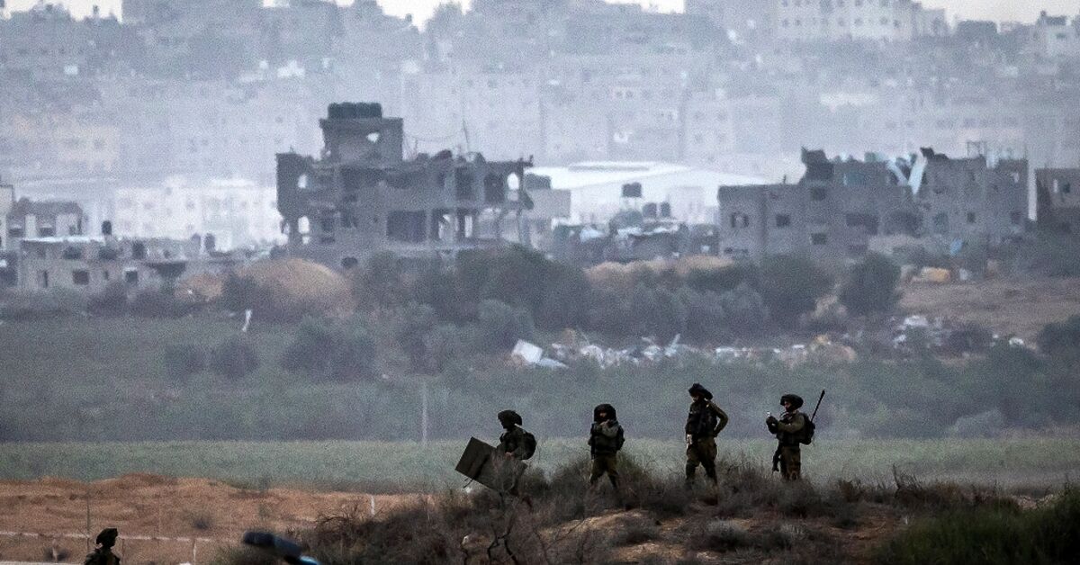 'Raise your hands': Israel raids hospital in centre of Gaza war - AL ...