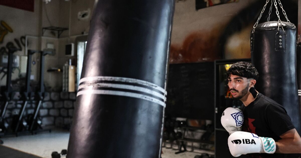 First Palestinian Olympic boxer fights hurdles before history - AL ...