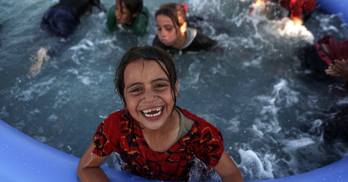 Mobile pools offer relief from heat to children in north Syria camps ...