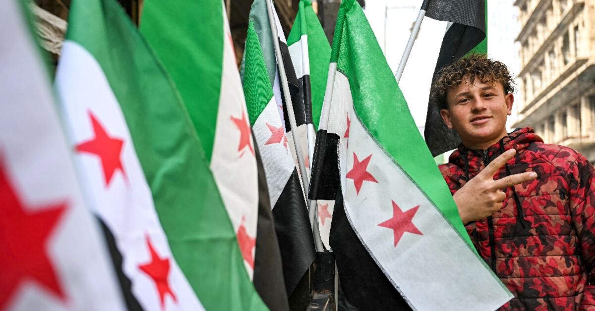 Syrians bring back independence flag with Assad's ouster - AL-MONITOR ...