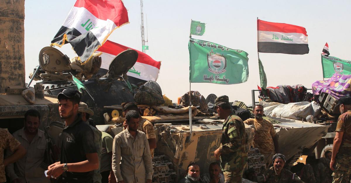 Shiite militias react angrily to decree integrating them into Iraqi ...