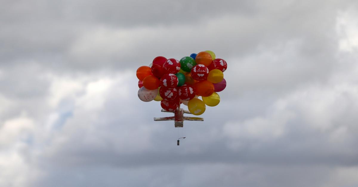After barrage of explosive balloons, Israel closes crossing point with ...